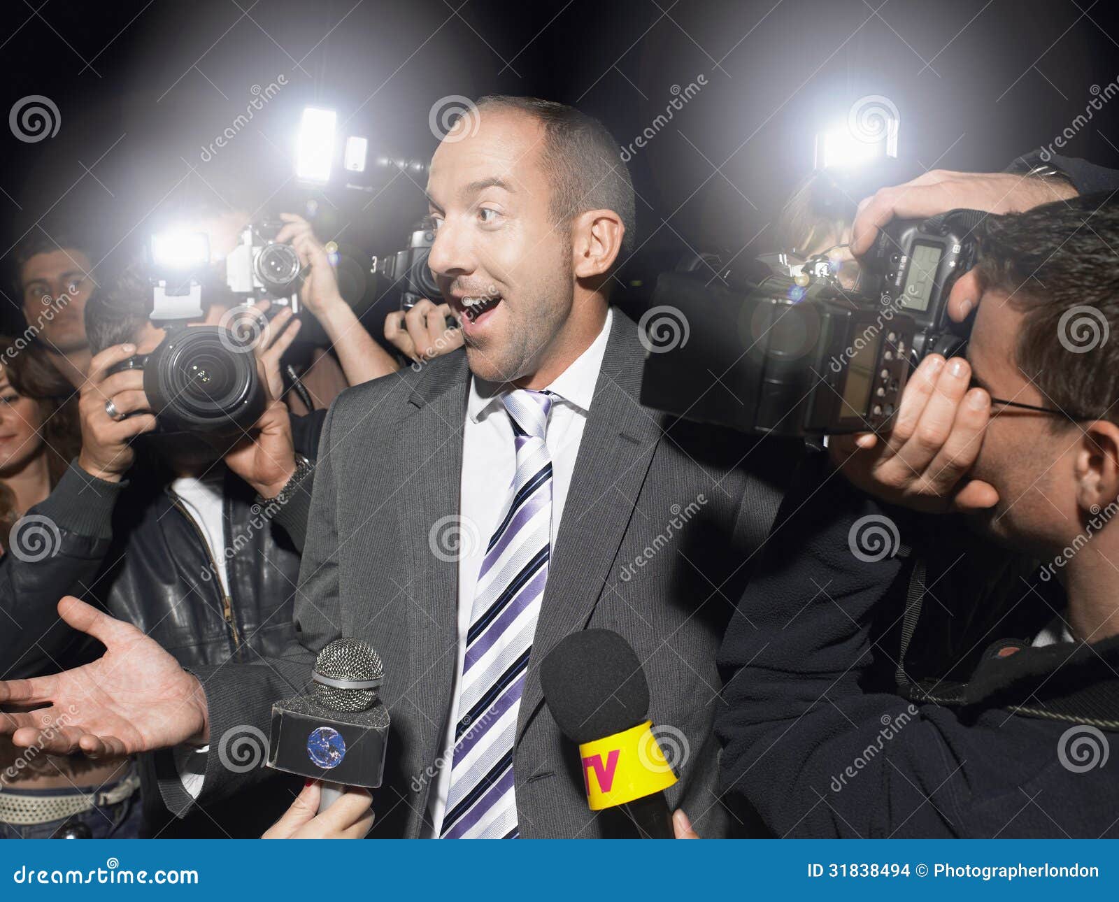 Surprised Man Surrounded by Paparazzi Stock Photo - Image of flash ...