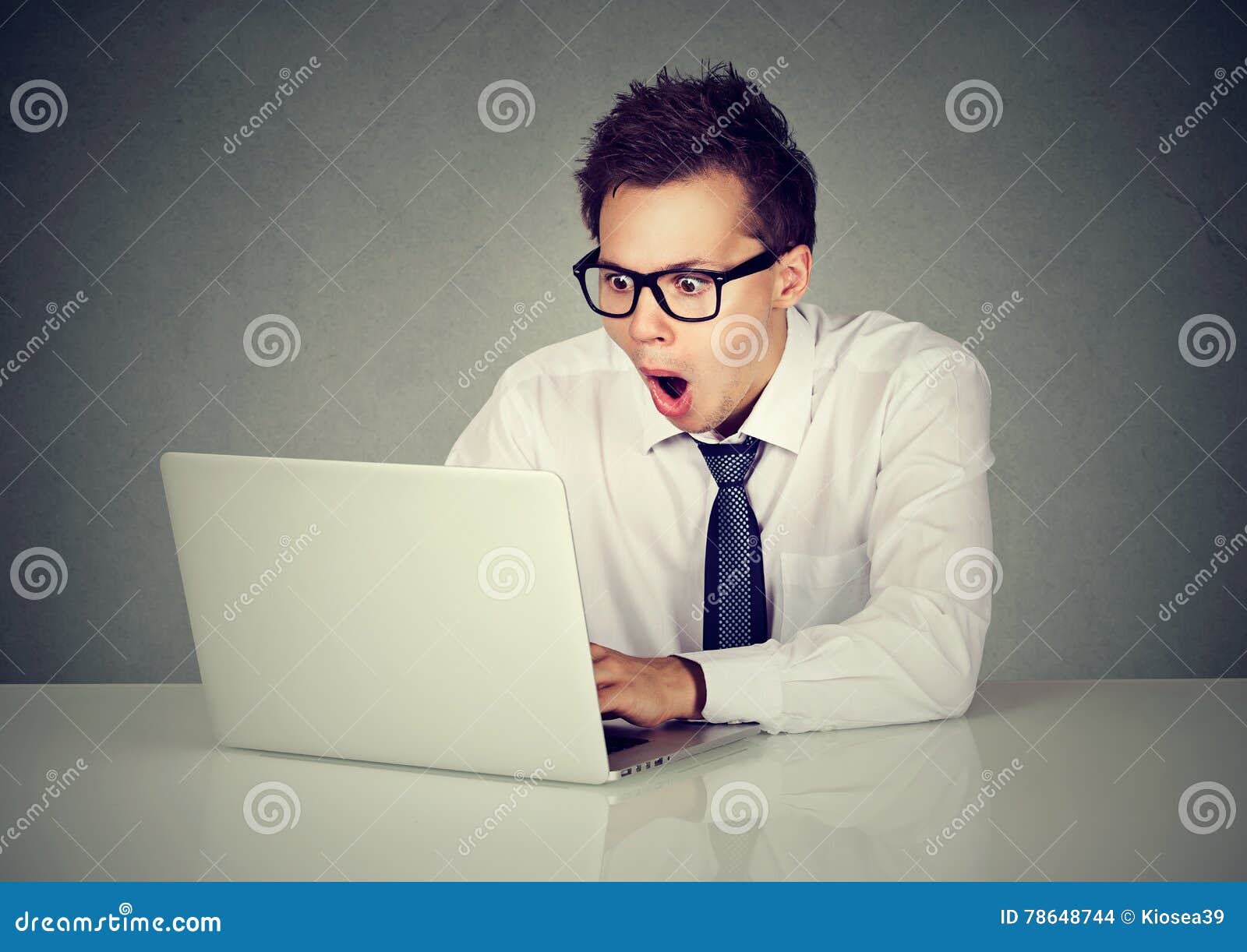 Surprised Man Using a Laptop Computer Stock Photo - Image of laptop ...