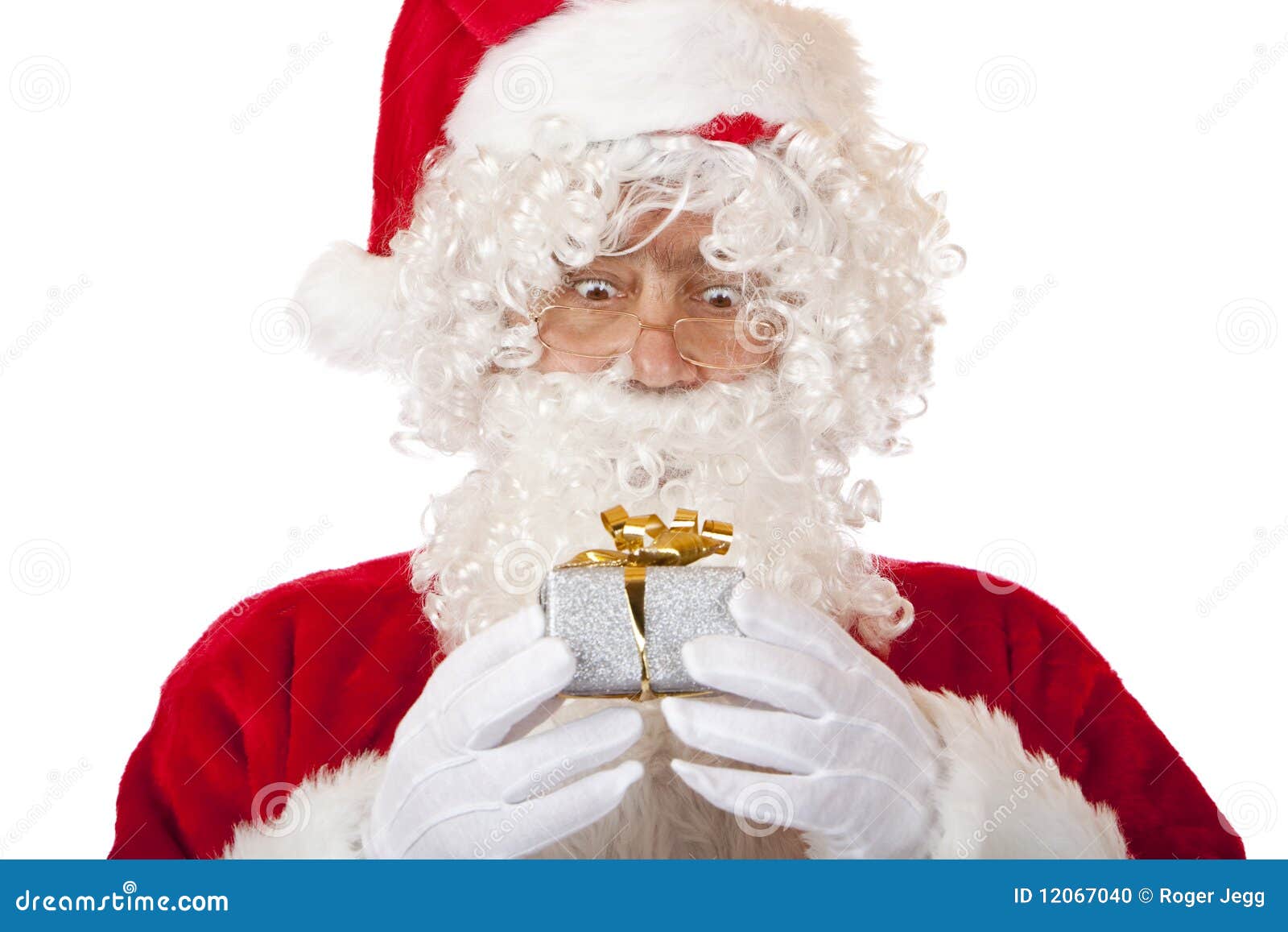 Surprised Santa Claus Holding Christmas Gift Stock Photo - Image of ...