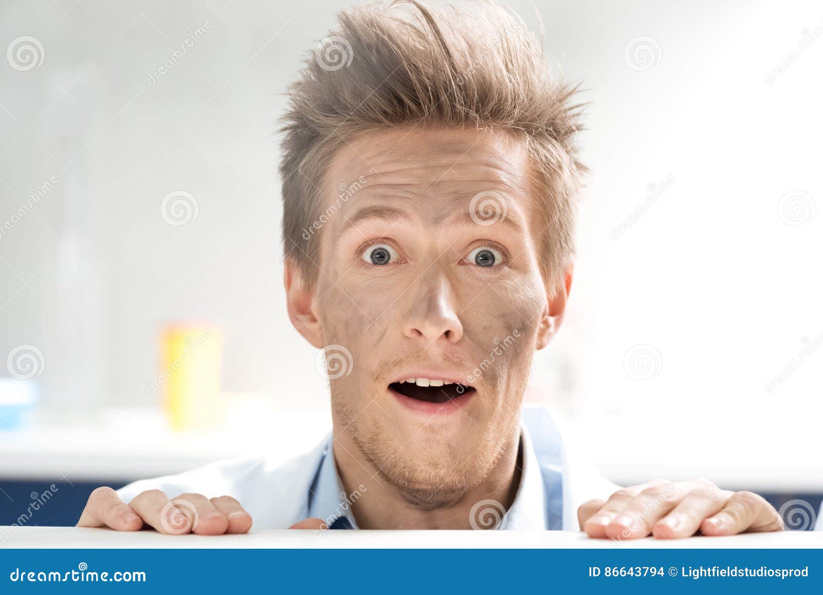 Surprised Scientist Looking Out Behind Table after Experiment in Lab ...