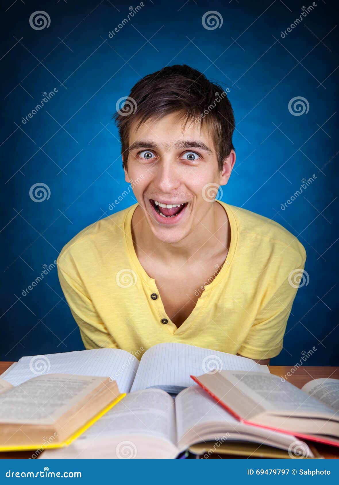 Surprised Student with a Books Stock Image - Image of desk, face: 69479797