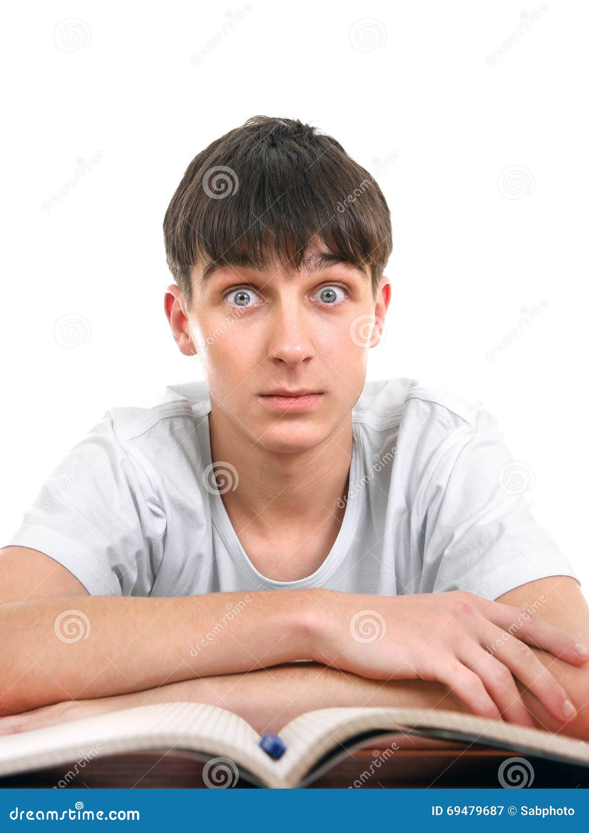 Surprised Student with a Books Stock Image - Image of male, pupil: 69479687