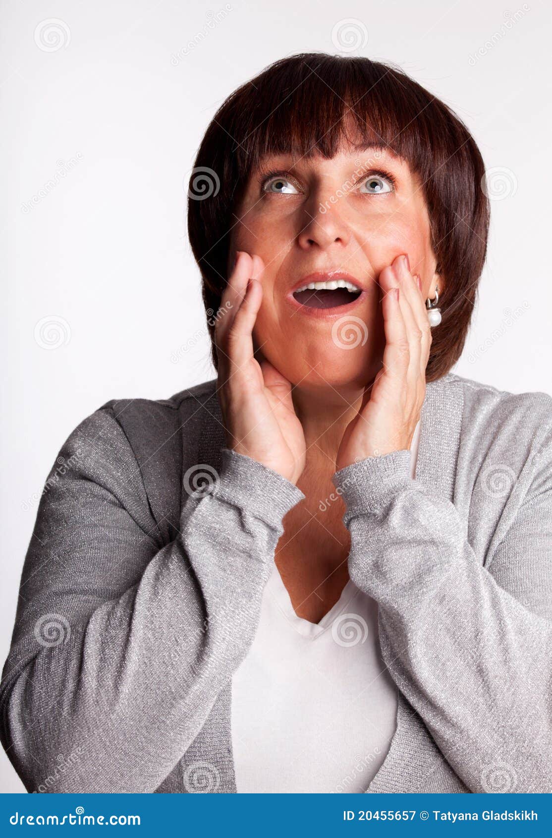 Surprised woman looking up stock image. Image of confidence - 20455657