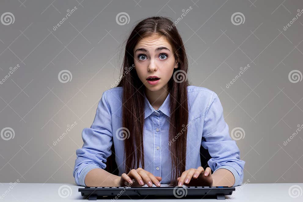 Surprised Woman Using Keyboard Stock Photo - Image of girl, device ...