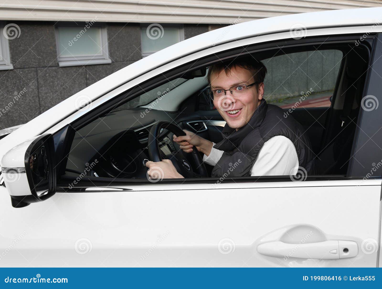 Surprised Young Man with Glasses Driving White Car Stock Photo - Image ...