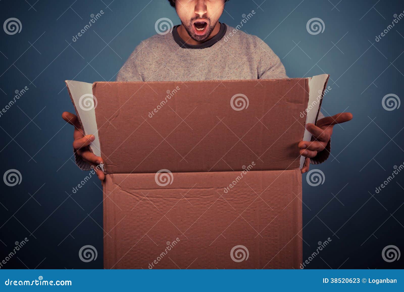 Surprised Young Man Opening Exciting Box Stock Image - Image of look ...