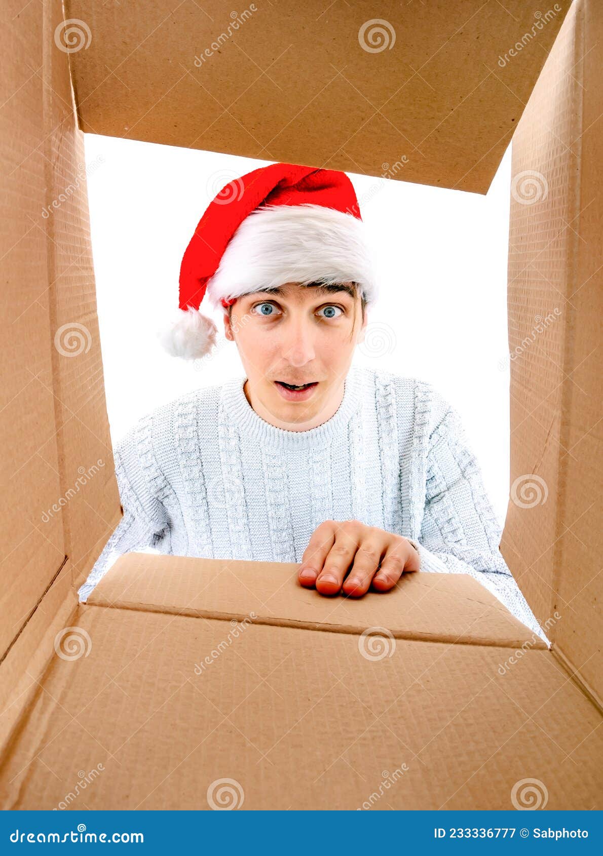 Young Man Looking Inside a Box Stock Image - Image of adolescent ...