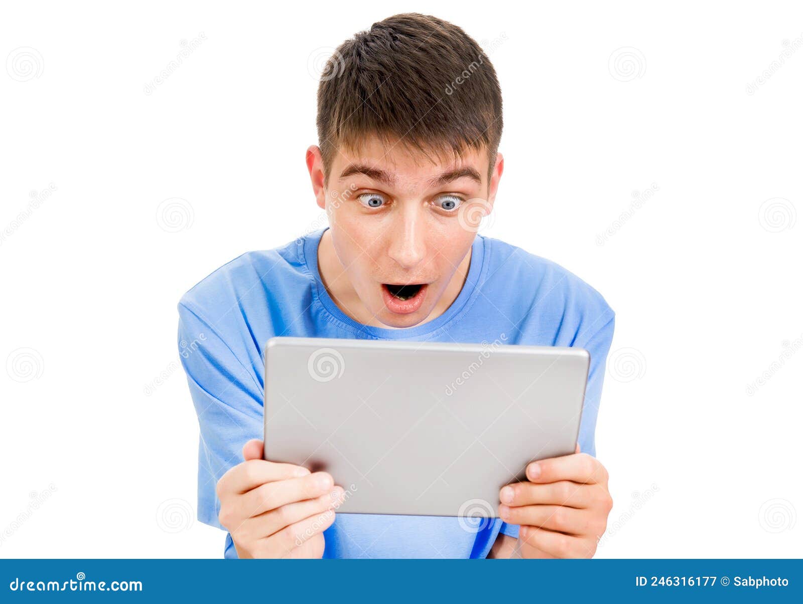 Surprised Young Man with a Tablet Stock Image - Image of hold, eyes ...