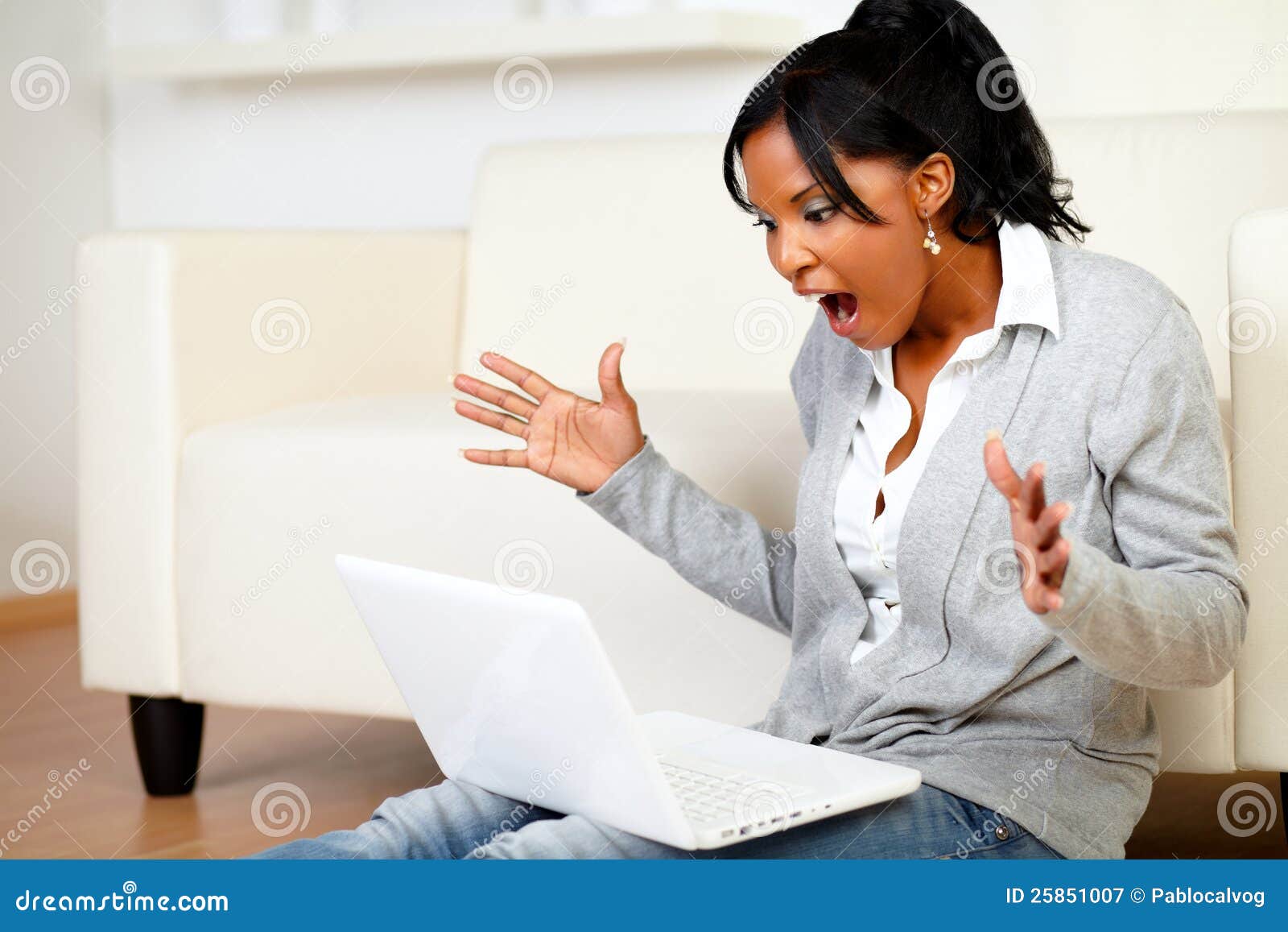 Surprised Young Woman Browsing the Internet Stock Image - Image of ...
