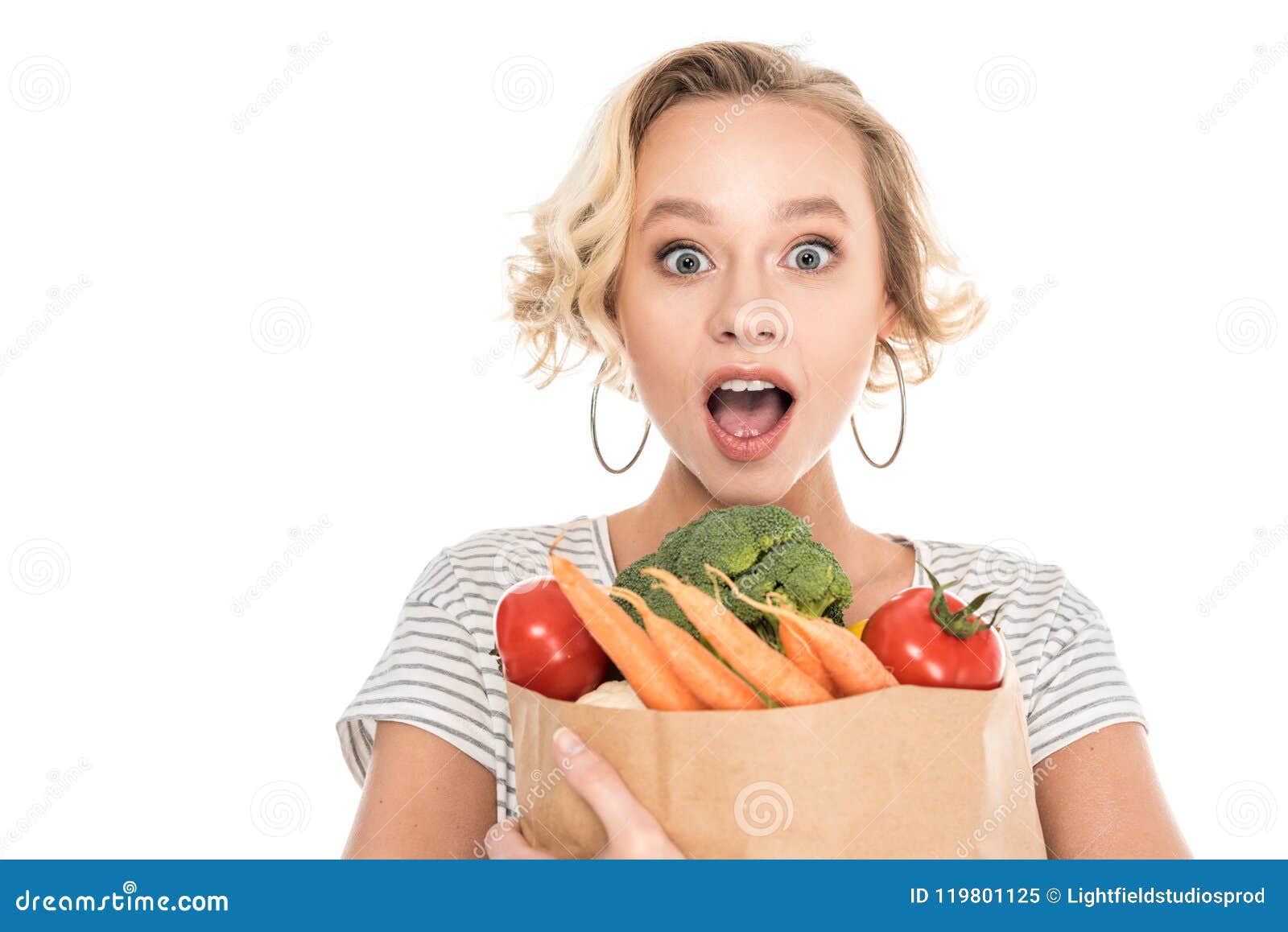 Surprised Young Woman Holding Grocery Bag and Looking at Camera Stock ... Surprised Young Woman Holding Grocery Bag and Looking at Camera Stock ...