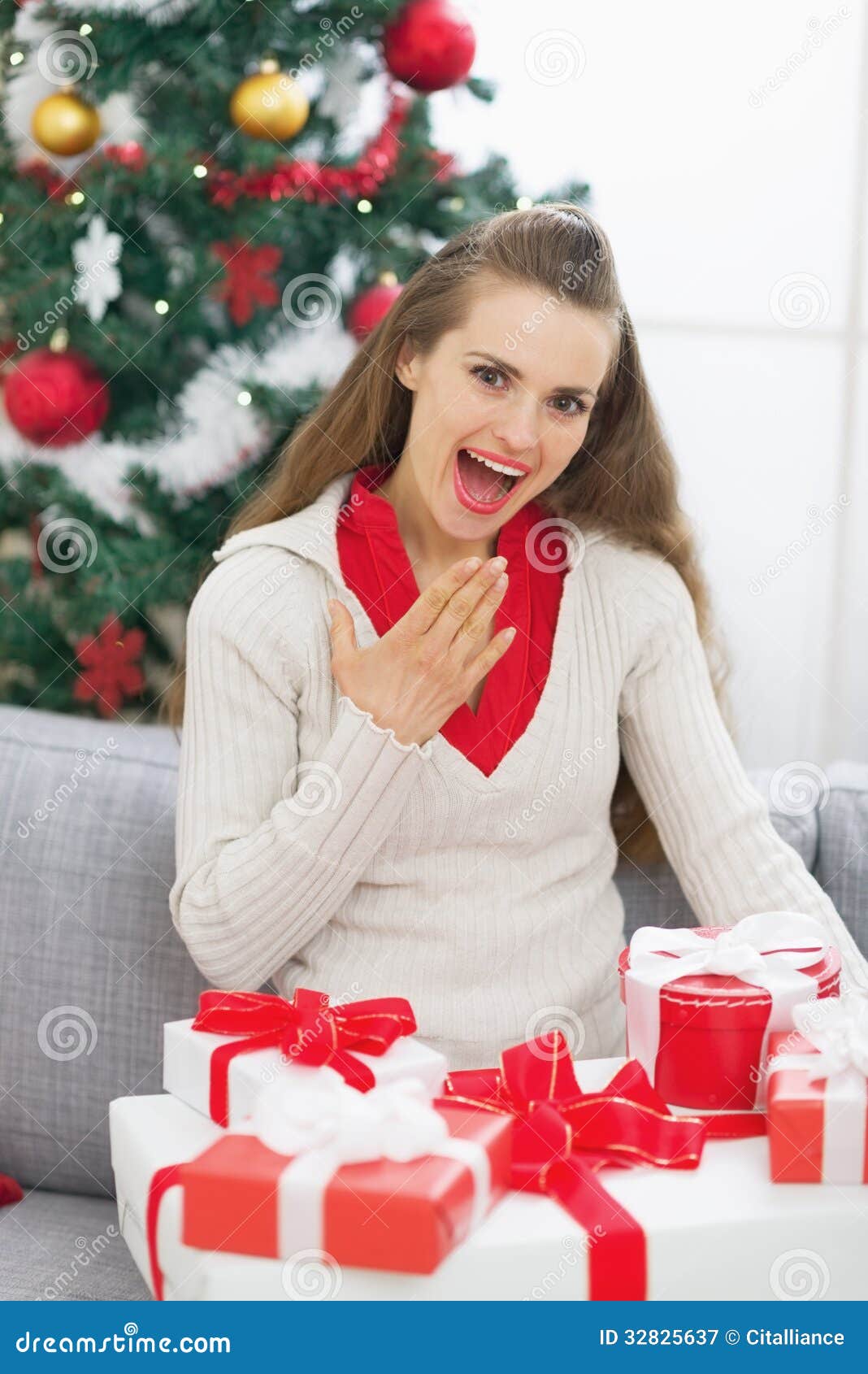 Surprised Young Woman with Present Boxes Near Christmas Tree Stock ...