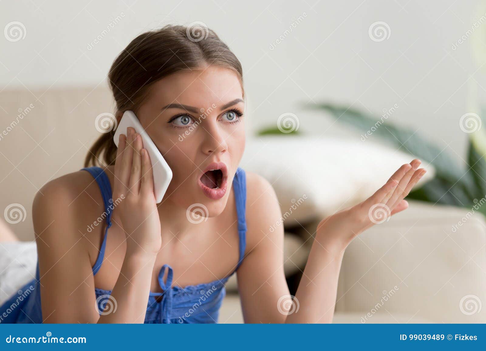 Surprised Young Woman Talking On Mobile Phone Stock Image Image Of