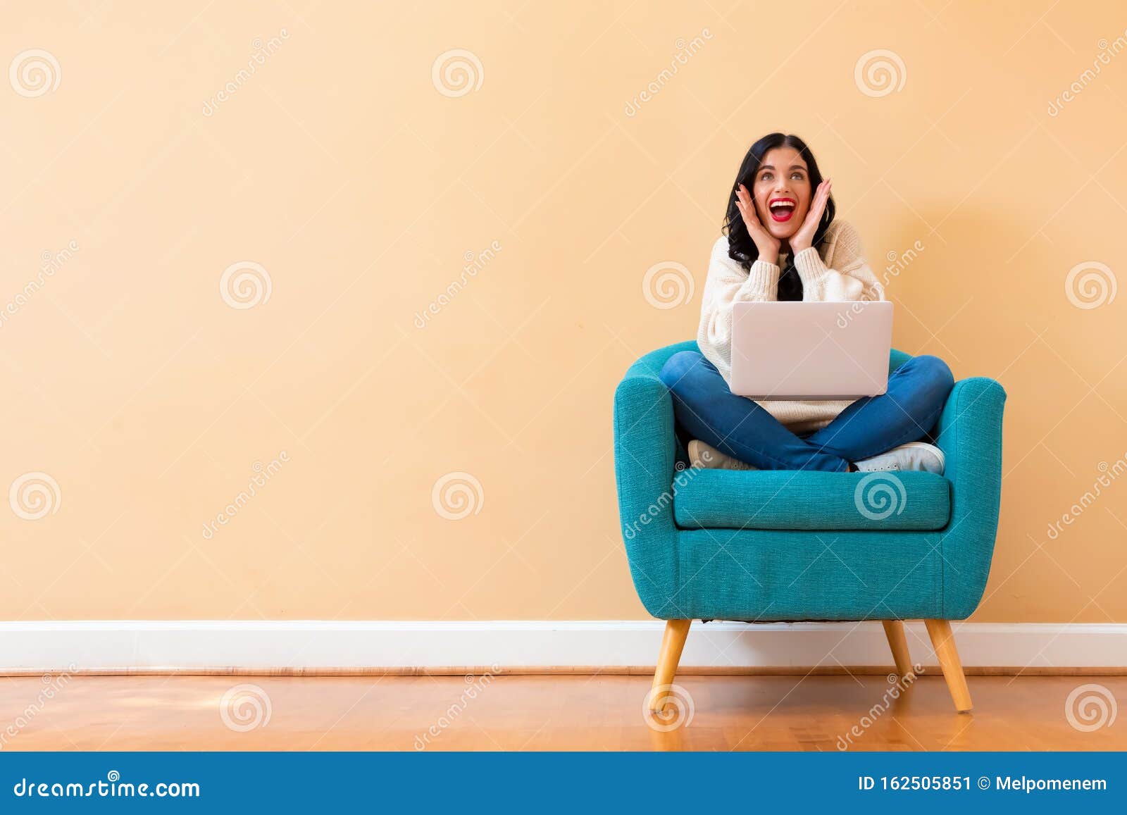 Surprised Young Woman Using a Laptop Computer Stock Image - Image of ...