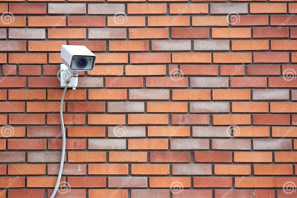 Surveillance Camera on a Brick Wall in Daylight Stock Image - Image of ...