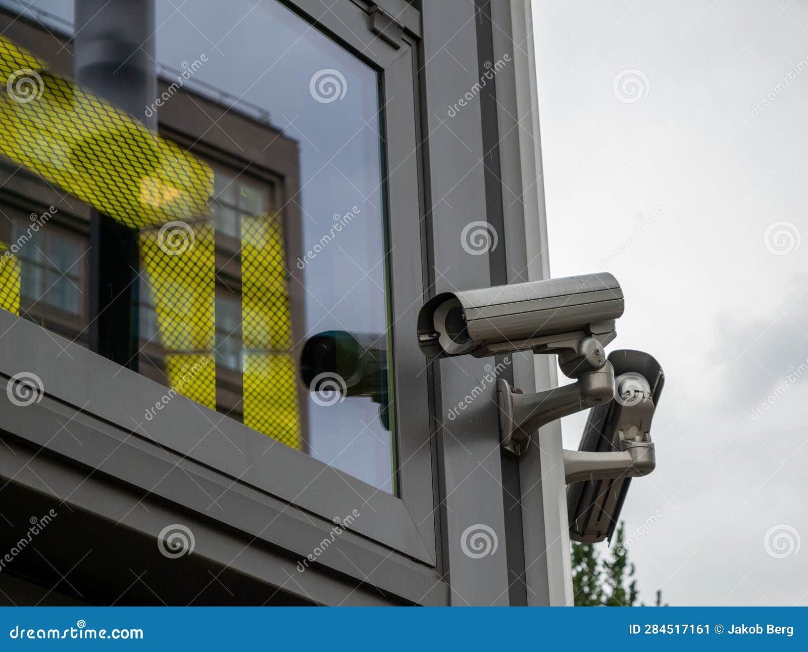 Surveillance Camera on the Facade of the Building. Stock Image - Image ...