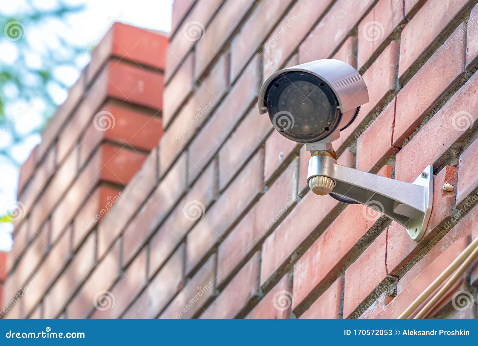 Surveillance Camera on Red Brick Wall Stock Image - Image of ...