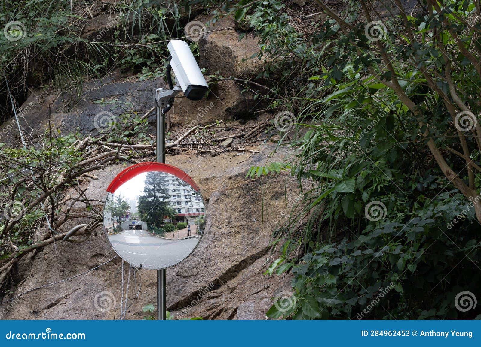 The Surveillance Camera beside the Rock Stock Image - Image of ...