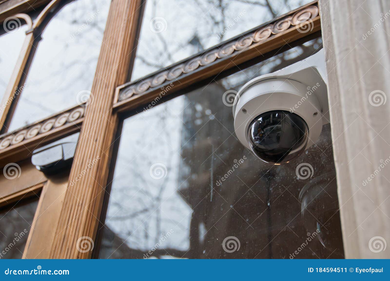 Surveillance CCTV Security Dome Camera Near Office Window in Europe ...