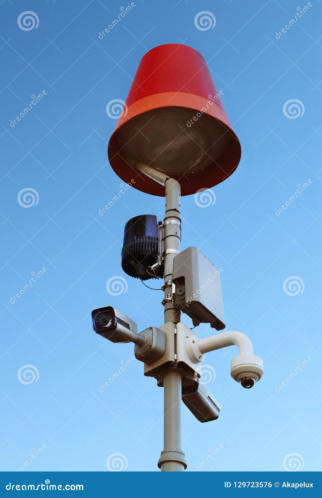 Surveillance System with an Orange Warning Light Located on a Pole in ...
