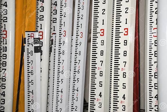 Surveying Measurement Sticks Stock Image - Image of length, pole: 6615111