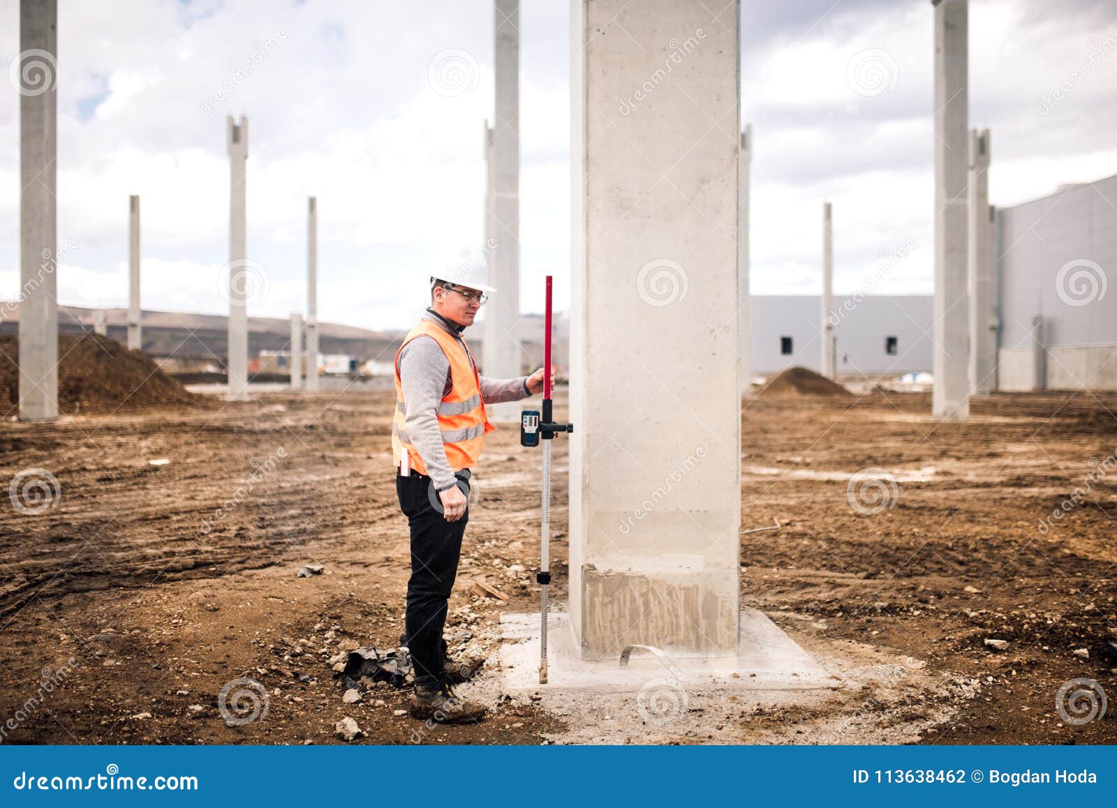 Surveyor Engineer with Theodolite Equipment and Tools at Construction ...