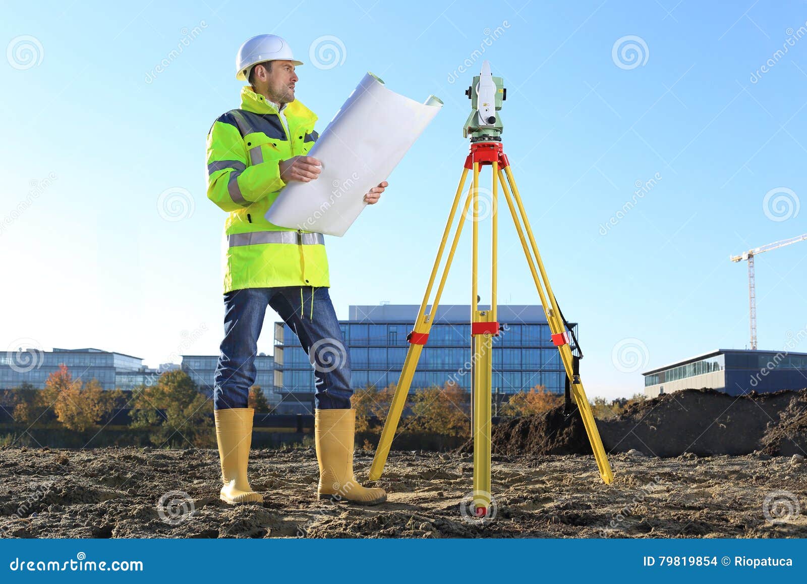 Surveyor on a Hill Holding a Plan Roll in Hands Stock Photo - Image of ...