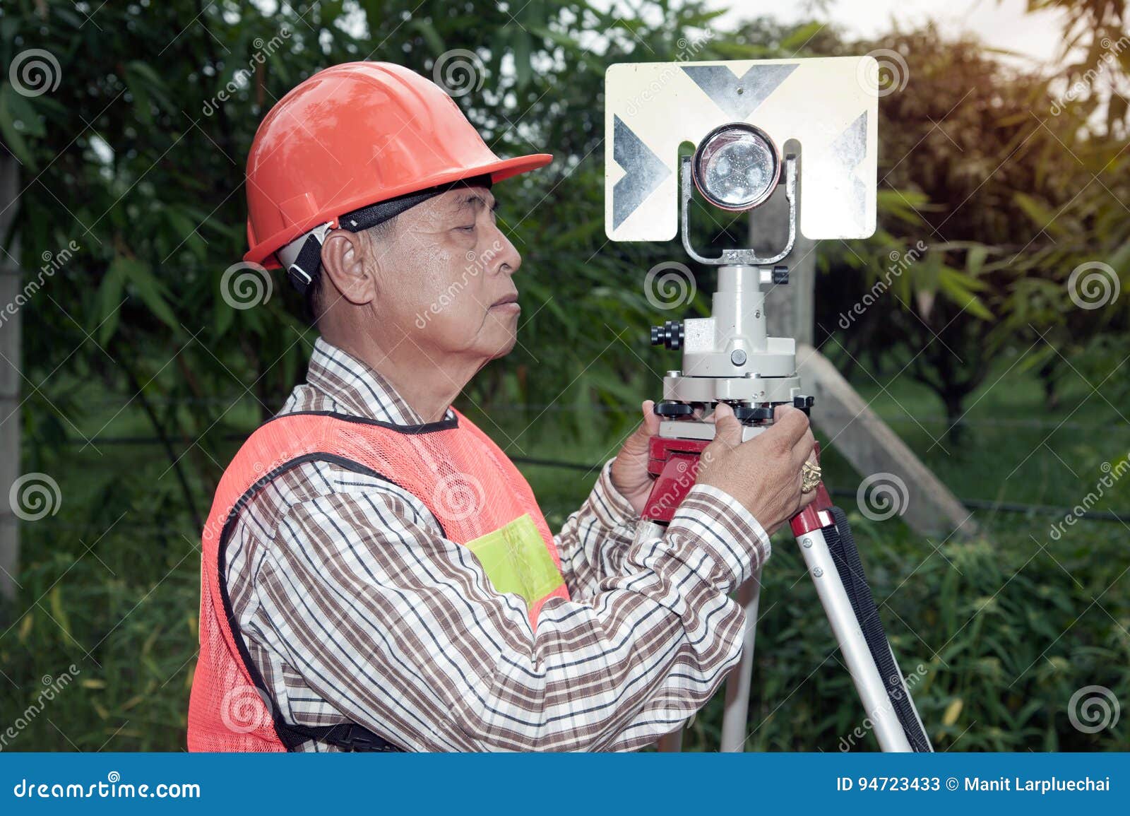 Surveyor Making Setting Prism Reflector on the Field. Stock Image ...