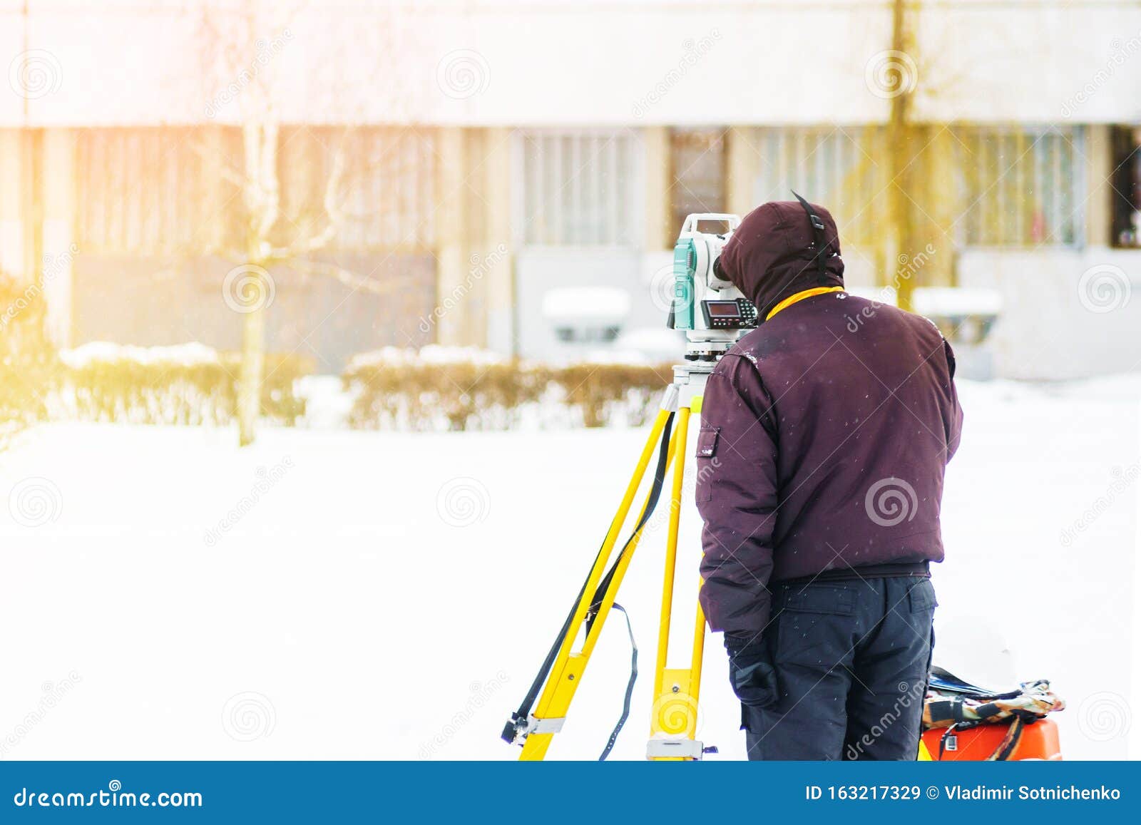 Surveyor Uses a Total Station in Construction Stock Image - Image of ...