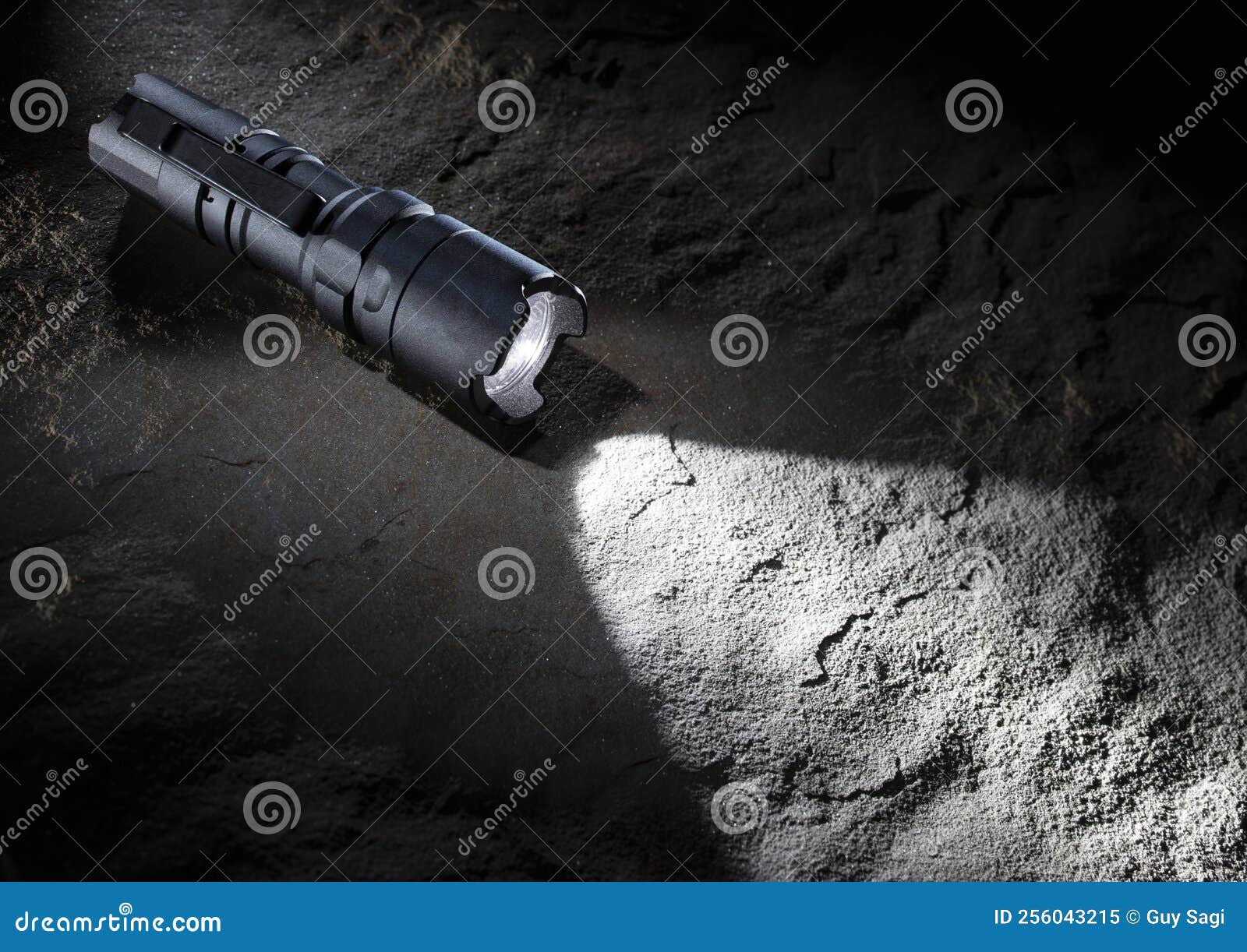 Survival Fflashlight on a Rock Stock Image - Image of rock, white ...