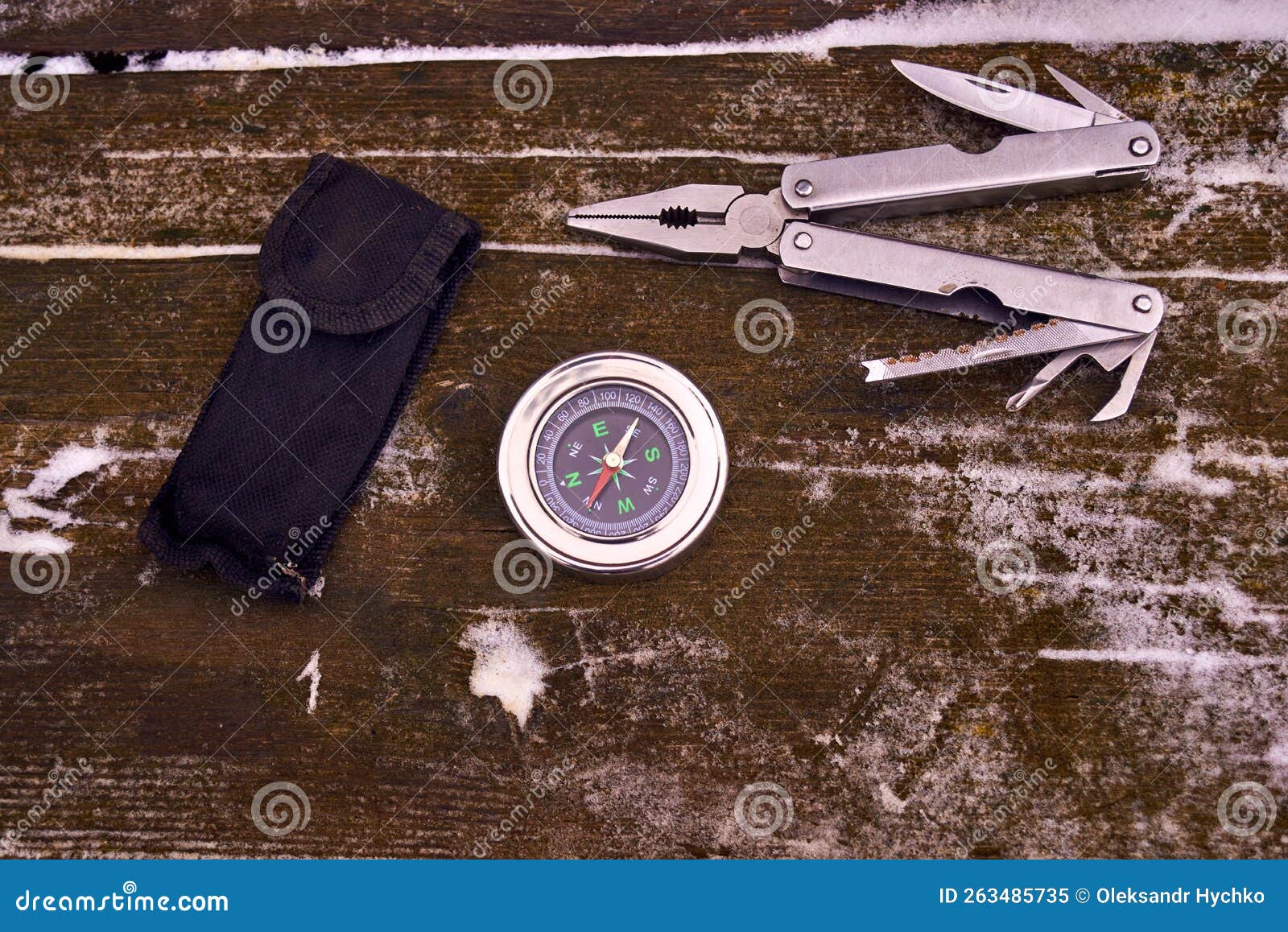 Compass and Multitool with Case on the Wood Stock Image - Image of ...