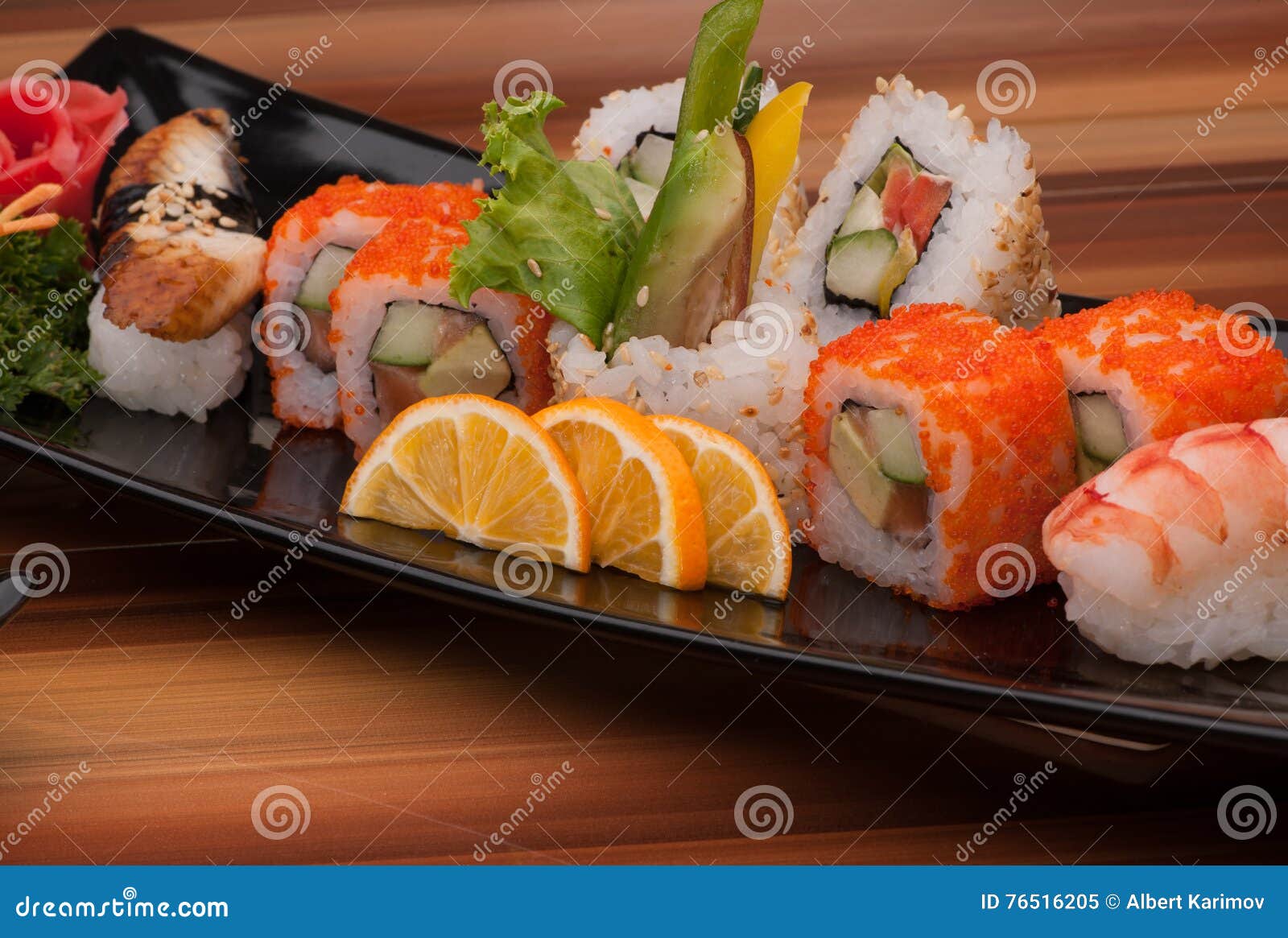 Sushi on a black plate stock image. Image of green, dark - 76516205