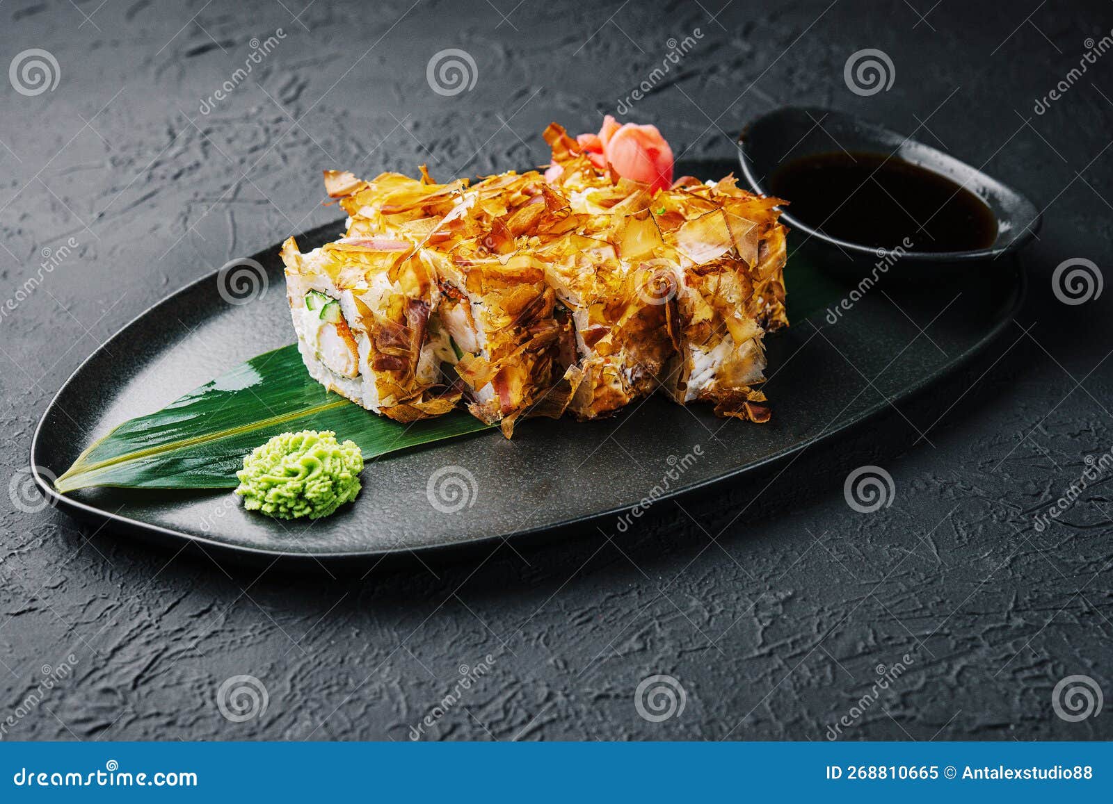 Sushi Bonito Roll on a Dark Plate Stock Image - Image of rice, cheese ...