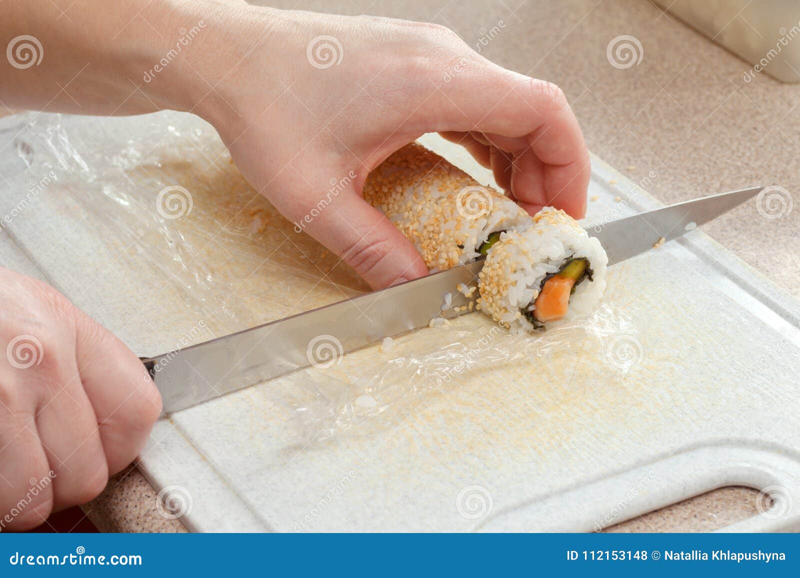 Sushi Making. Chef Sliced Sushi Rolls. Stock Photo - Image of kitchen ...