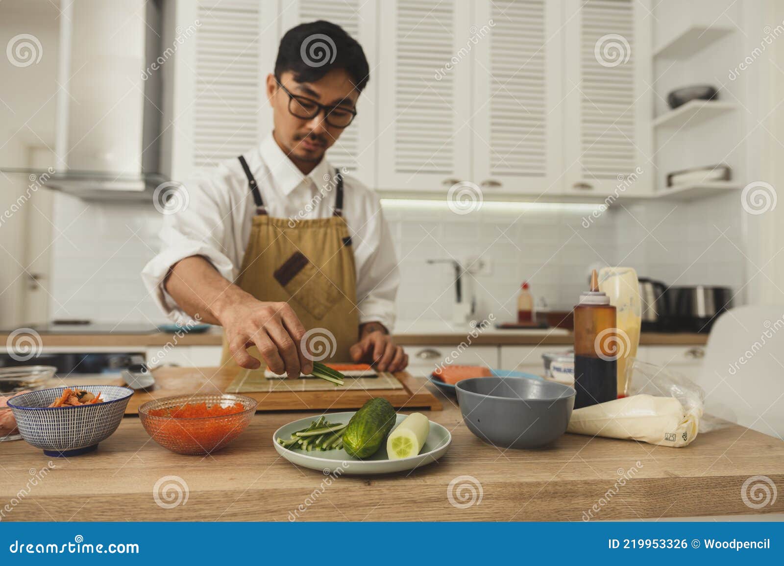 Sushi Master Chef Cutting Slim Slices Of Tuna Fish Sashimi In An ...