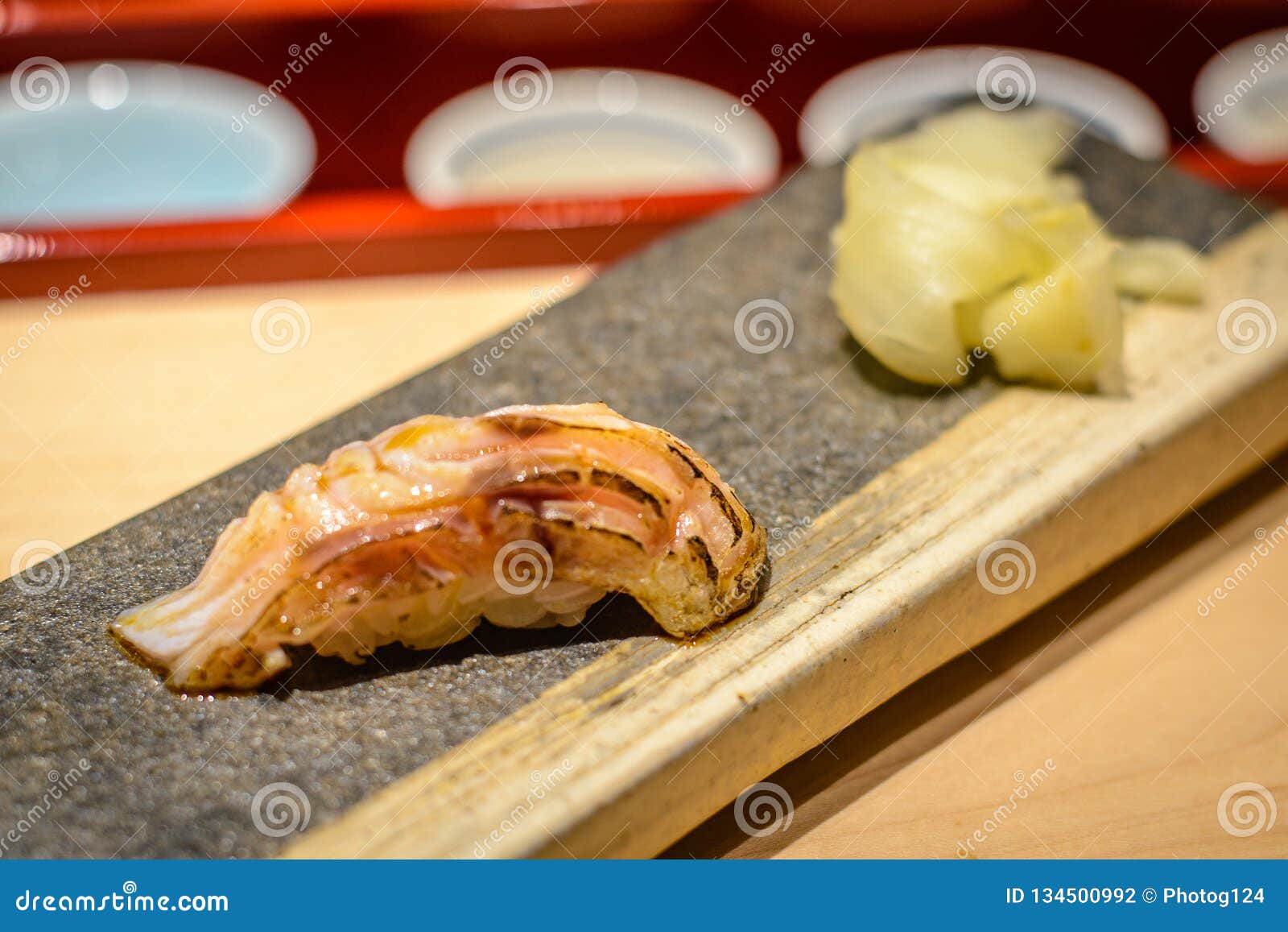 Sushi Raw Fish on Rice Served on a Plate Stock Photo - Image of fine ...