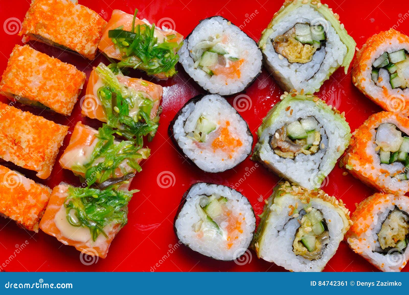 Sushi on a red plate stock image. Image of japanese, delicacy - 84742361