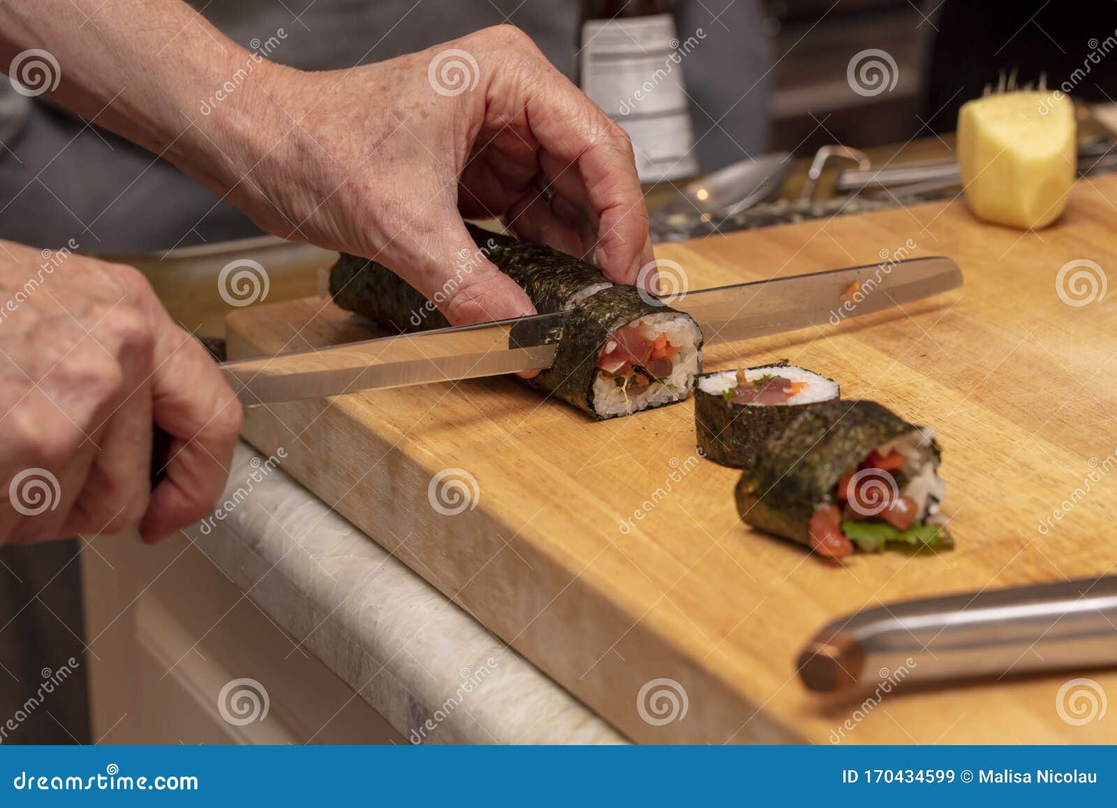 Sushi Roll Being Sliced in a Demonstaration Class Stock Image - Image ...