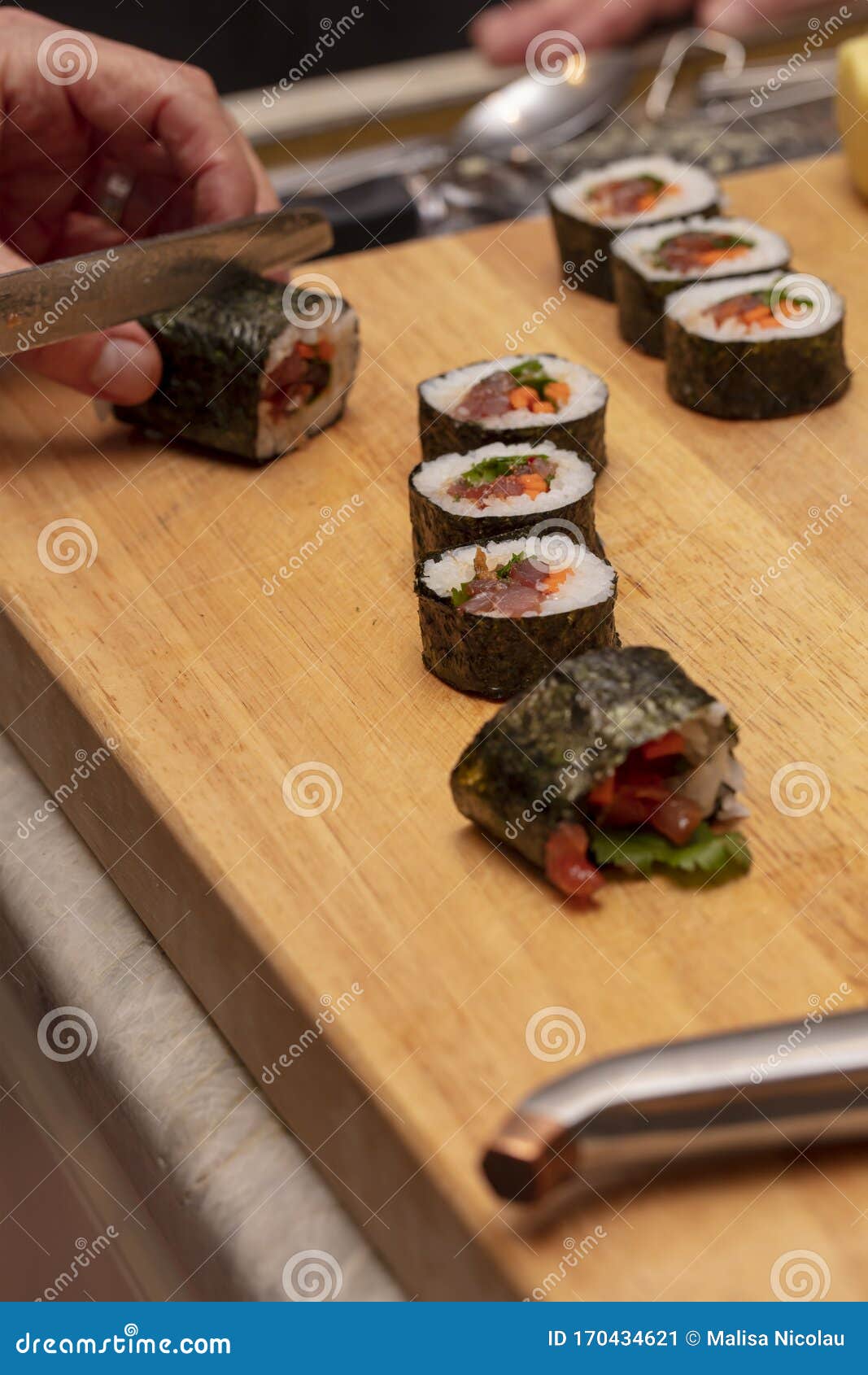 Sushi Roll Being Sliced in a Demonstaration Class Stock Image - Image ...