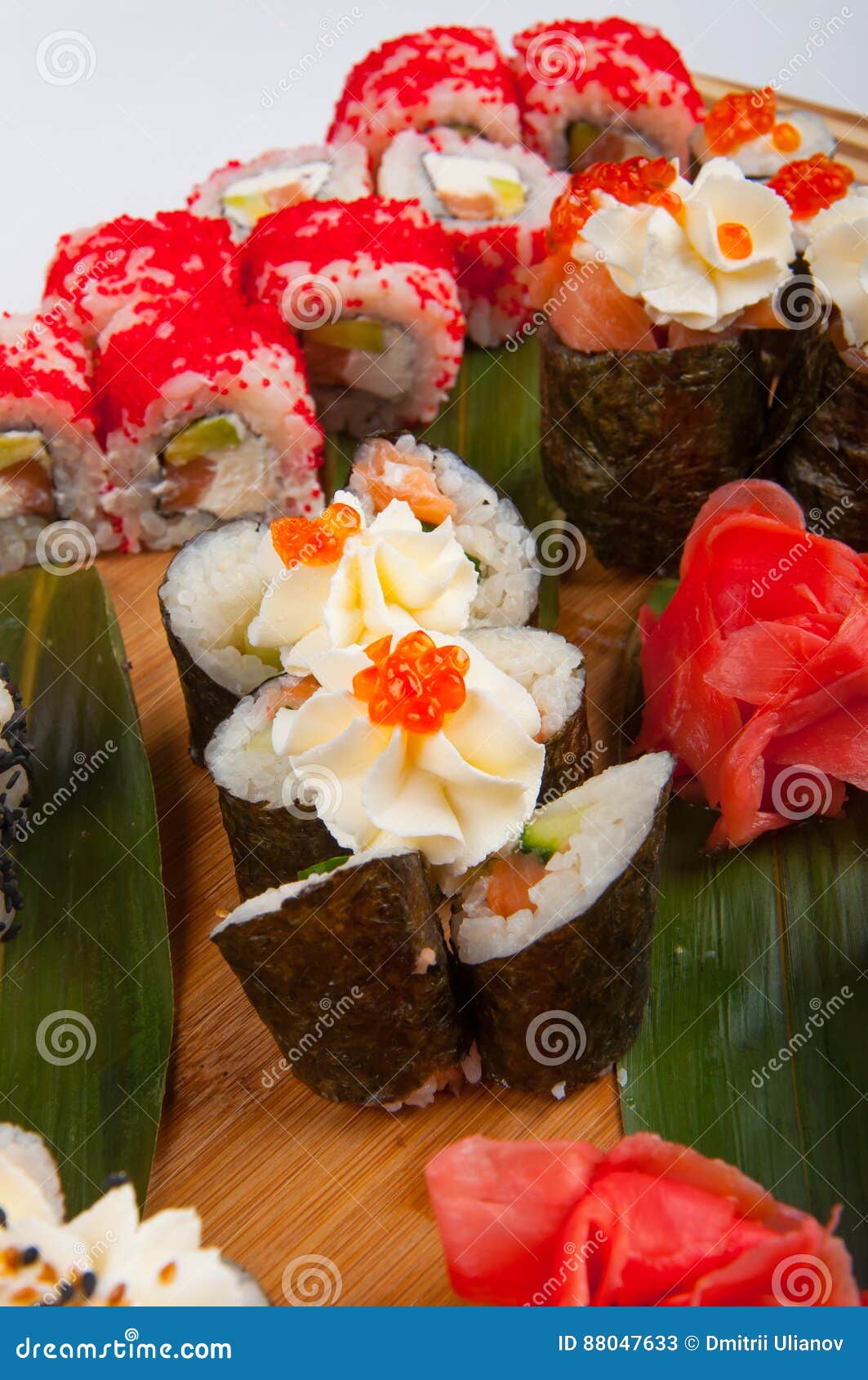 Sushi Rolls Assorted on a Wooden Board Concept: Delivery Stock Image ...