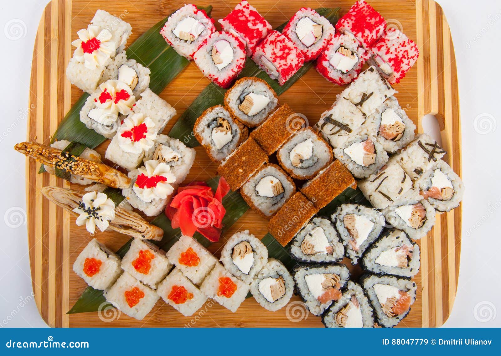 Sushi Rolls Assorted on a Wooden Board Concept: Delivery Stock Image ...