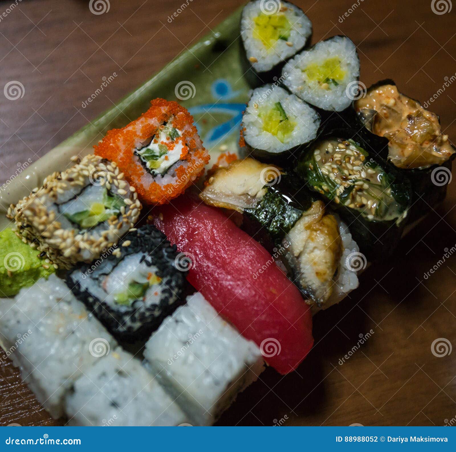 Sushi and Rolls on a Rectangular Plate Stock Photo - Image of oriental ...
