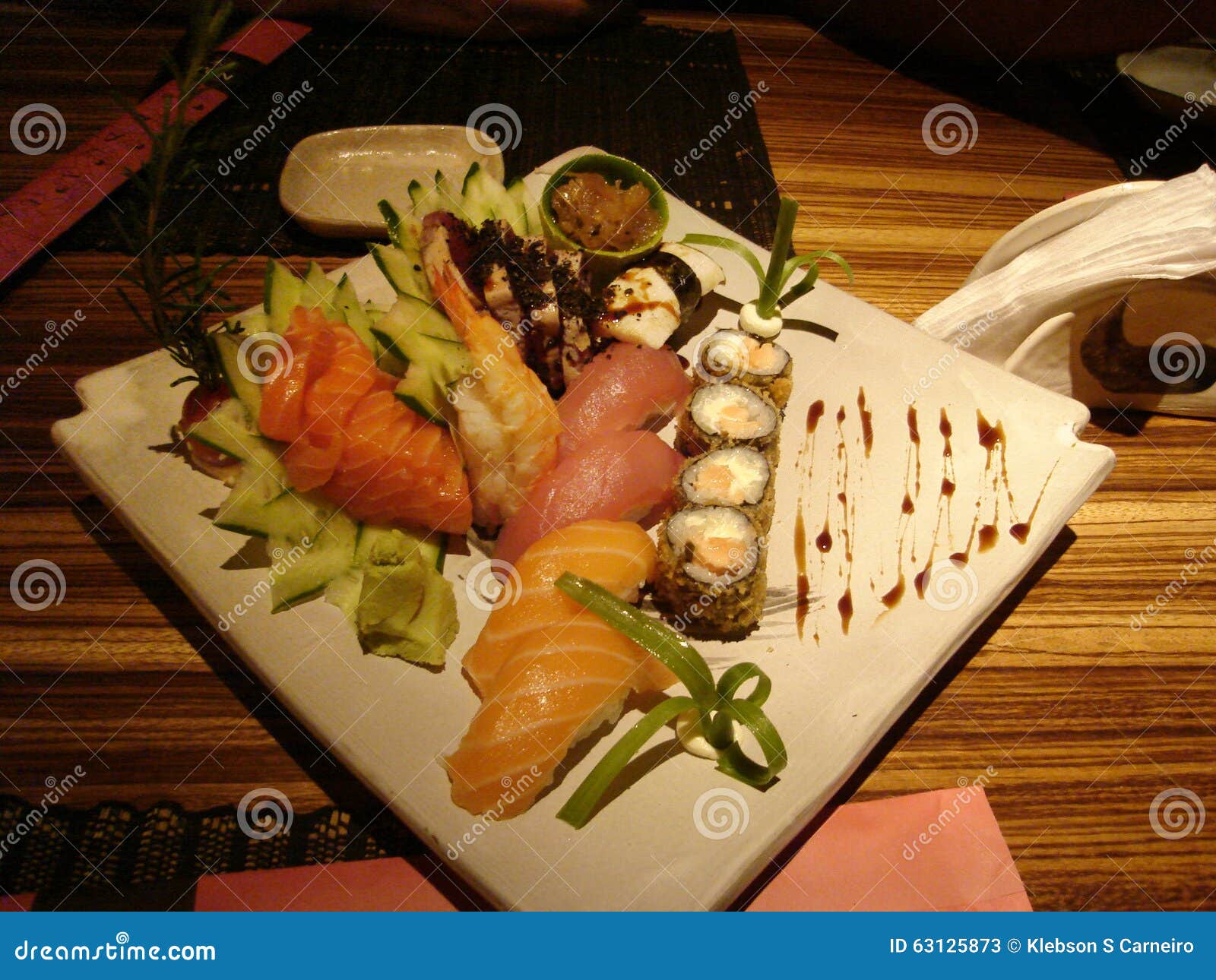 Sushi and Sashimi plate stock image. Image of napkins - 63125873