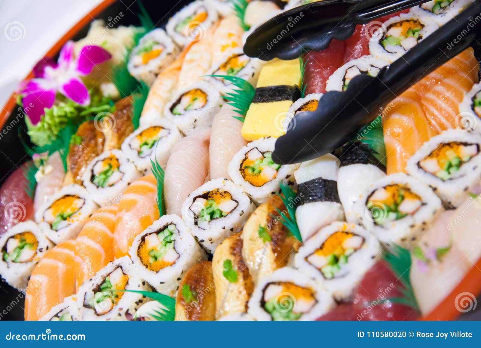 Sushi and Sashimi in a Western Style Serving Stock Photo - Image of ...