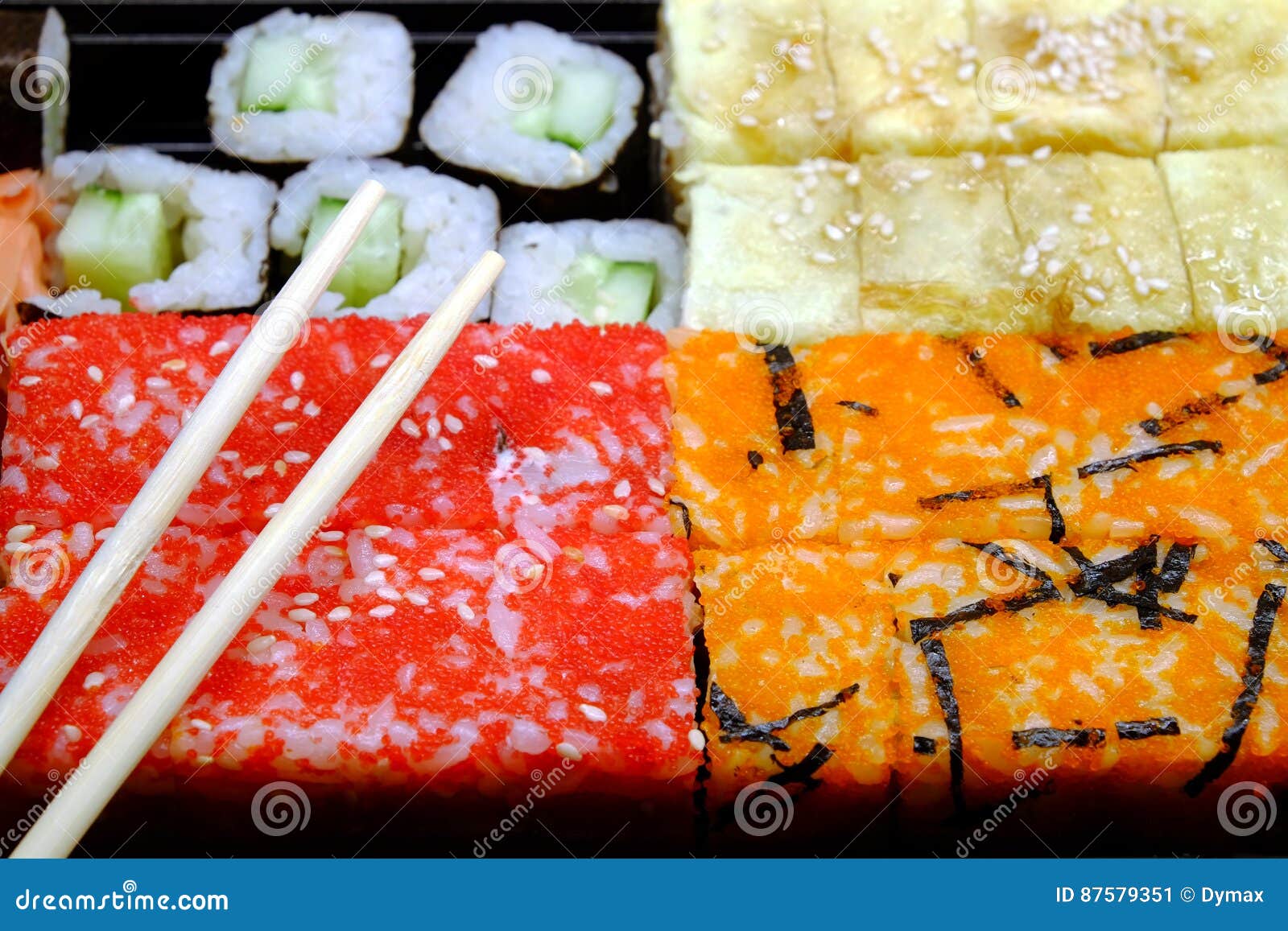 Sushi on Square Tray on Brown Wooden Table Side View Closeup Stock ...