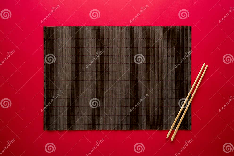 Sushi Sticks and Empty Bamboo Mat on Red Background Stock Photo - Image ...
