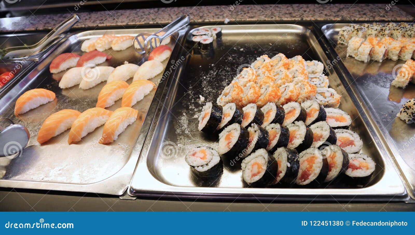 Sushi on the Trays of a Japanese Restaurant Stock Photo - Image of ...