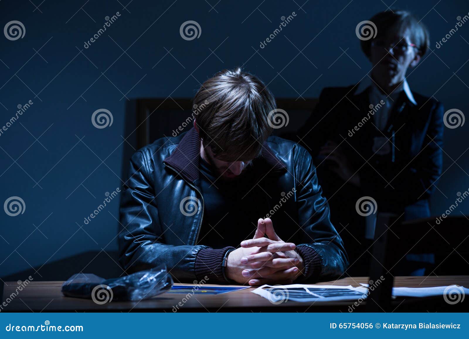 Suspect with head down stock photo. Image of authority - 65754056