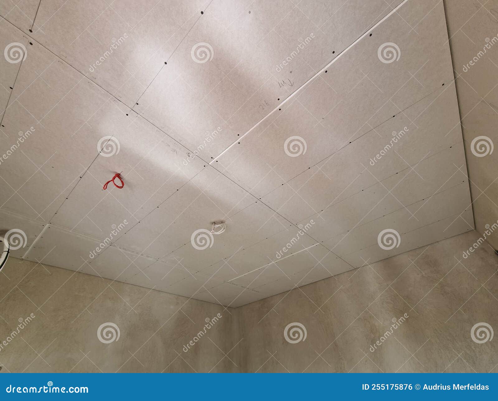 Drywall Plaster Wall Metal Fixation. Man Holding Metal Ruler Against ...