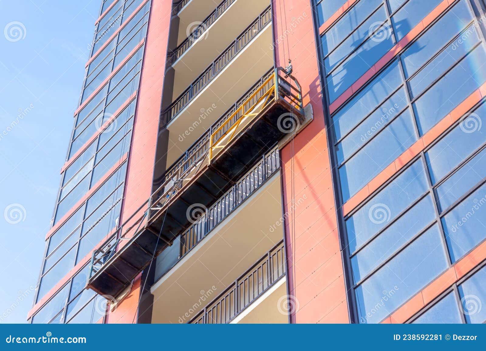 Suspended Elevator on a High Residential Building Under Construction ...