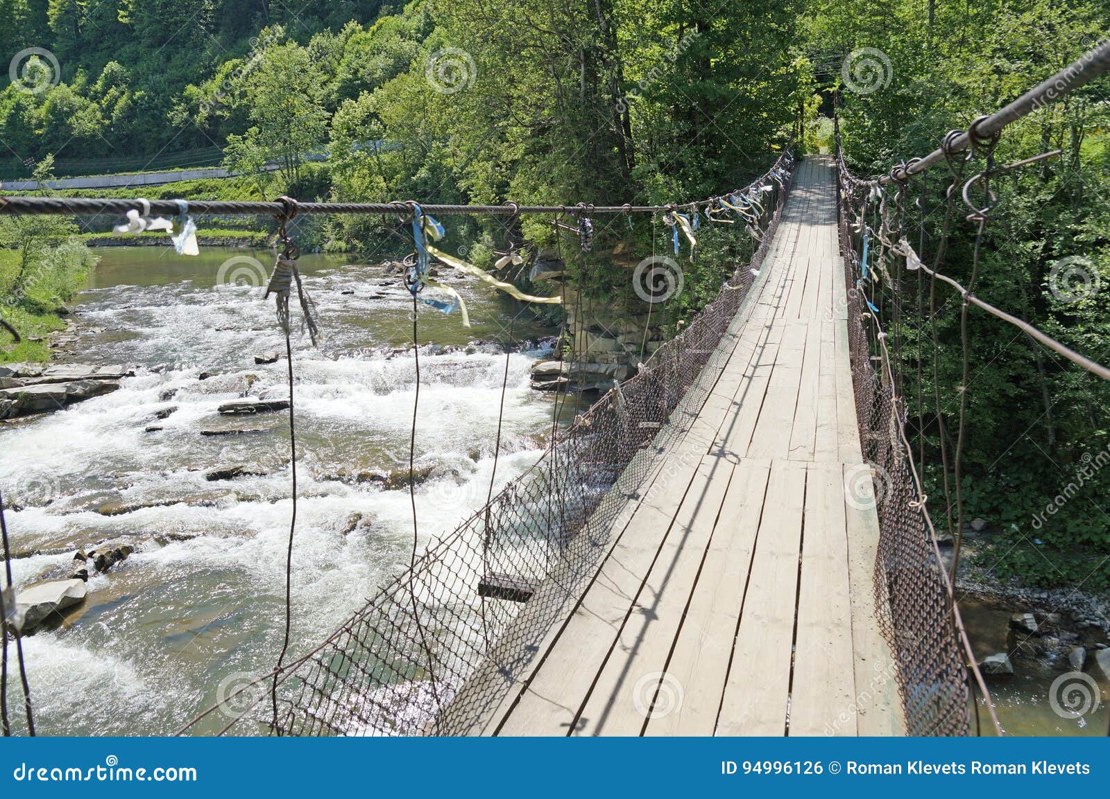 Suspension bridge stock photo. Image of rapids, wind - 94996126